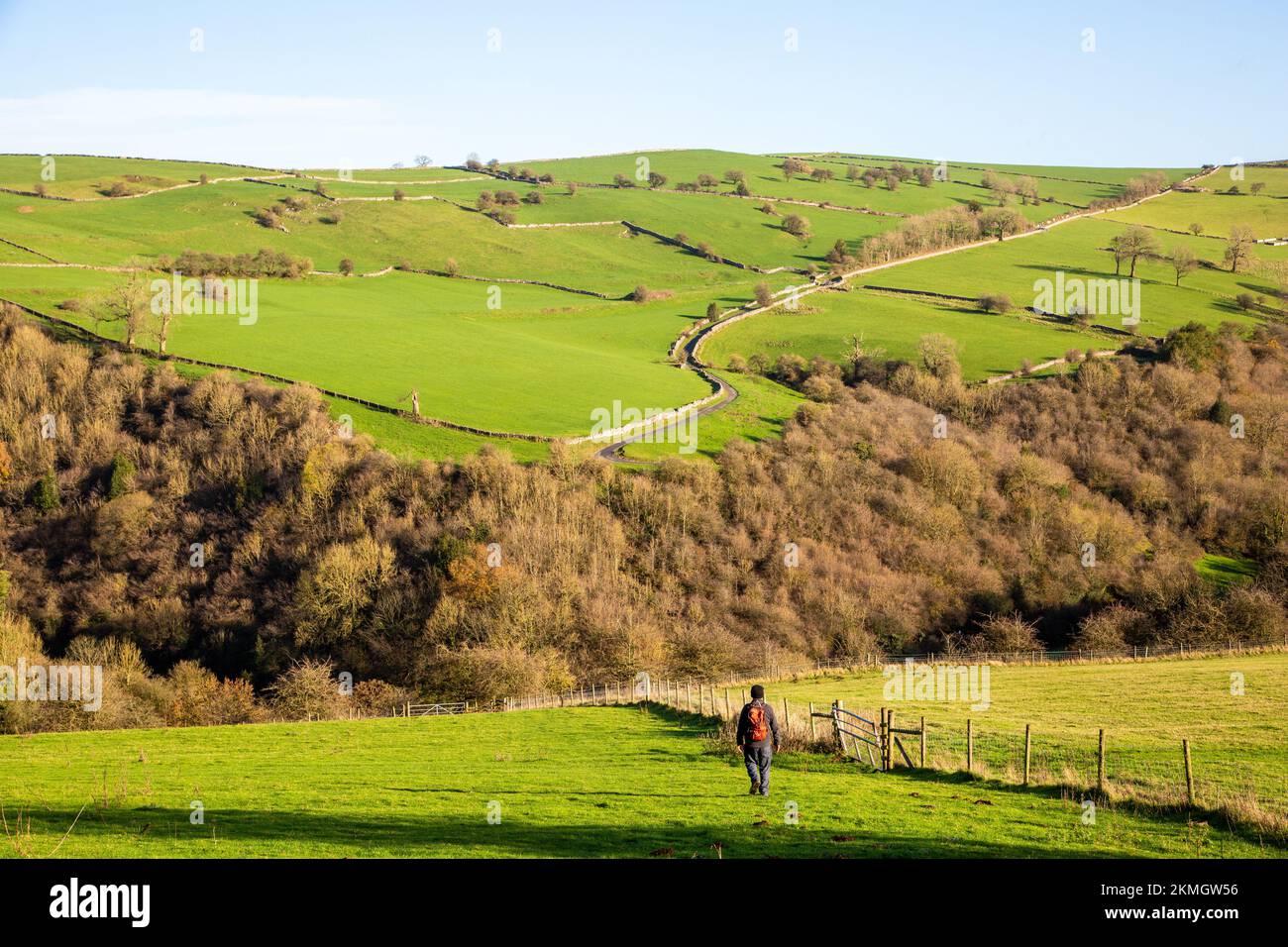 Man walking in the North Staffordshire Peak District countryside over ...