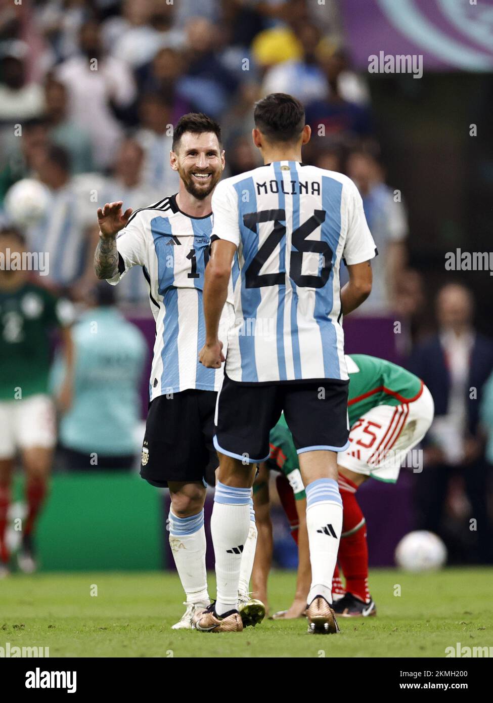 LUSAIL CITY - (l-r) Lionel Messi of Argentina, Nahuel Molina of ...