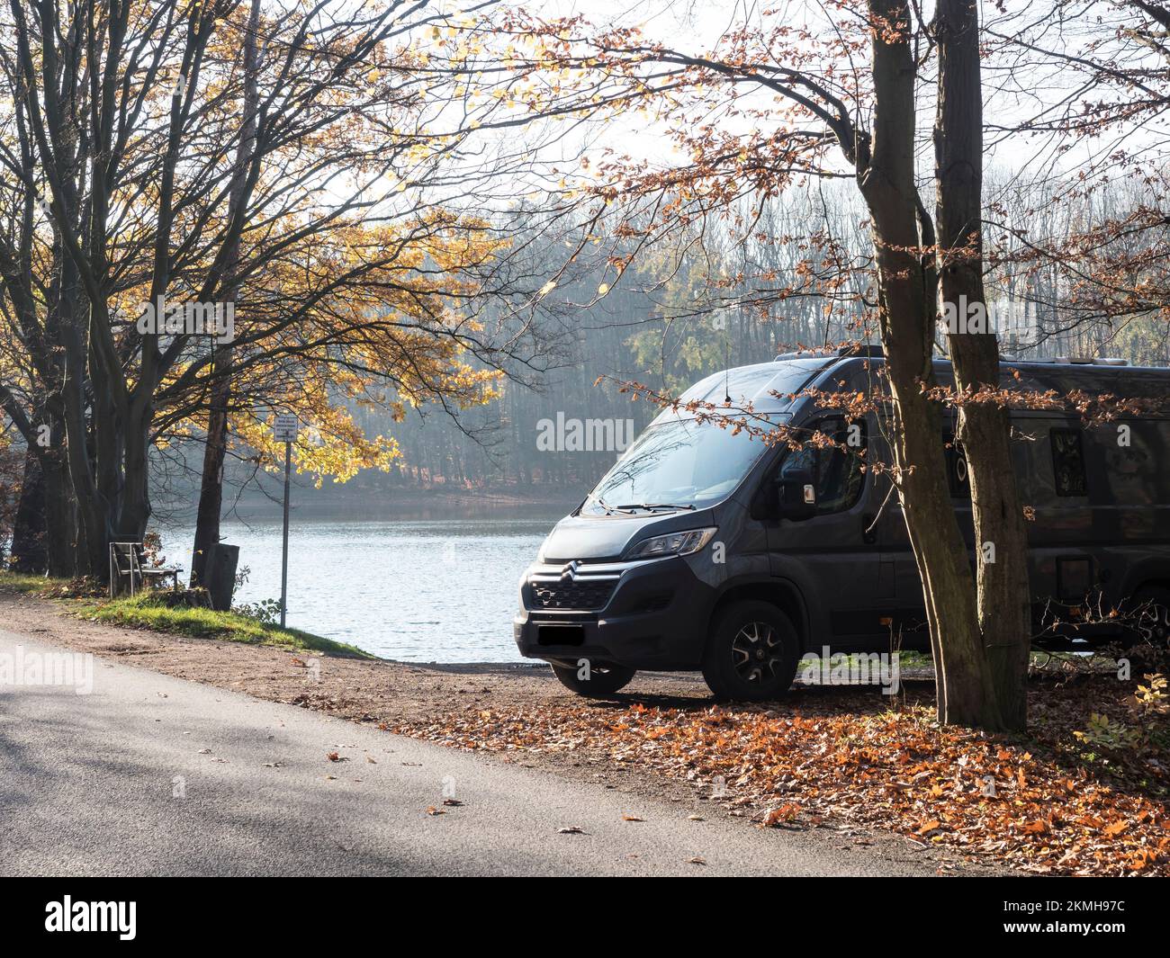 Camper van parks at lake Mittelteich near castle Moritzburg, Germany ...