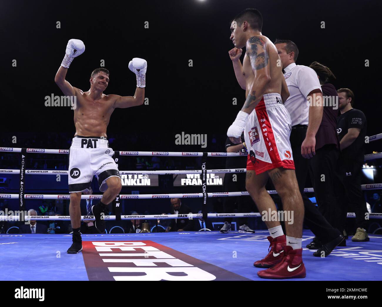 Pat McCormack (left) celebrates victory against Christian Nicolas ...
