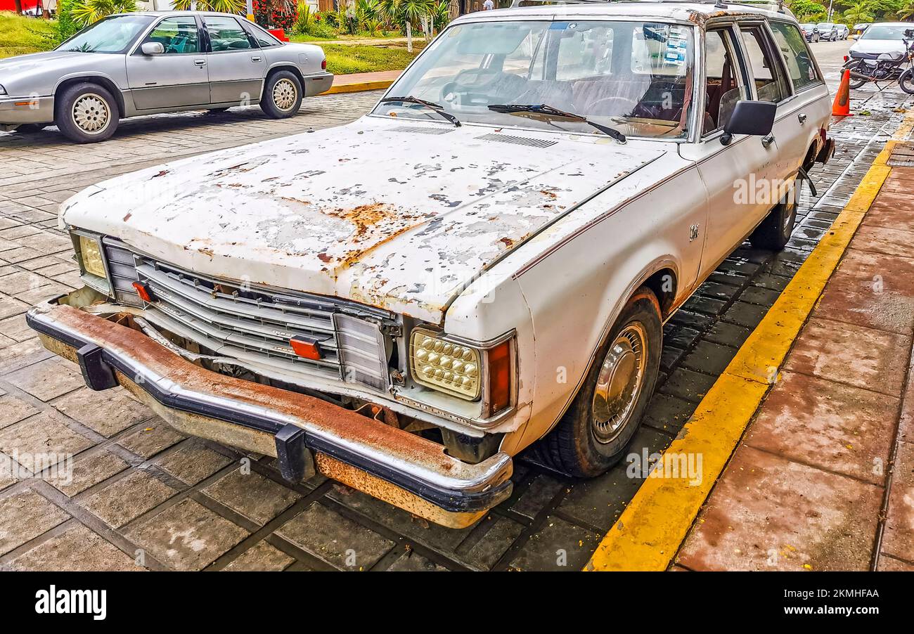 Various colorful tuned cars and classic vintage cars in Puerto ...