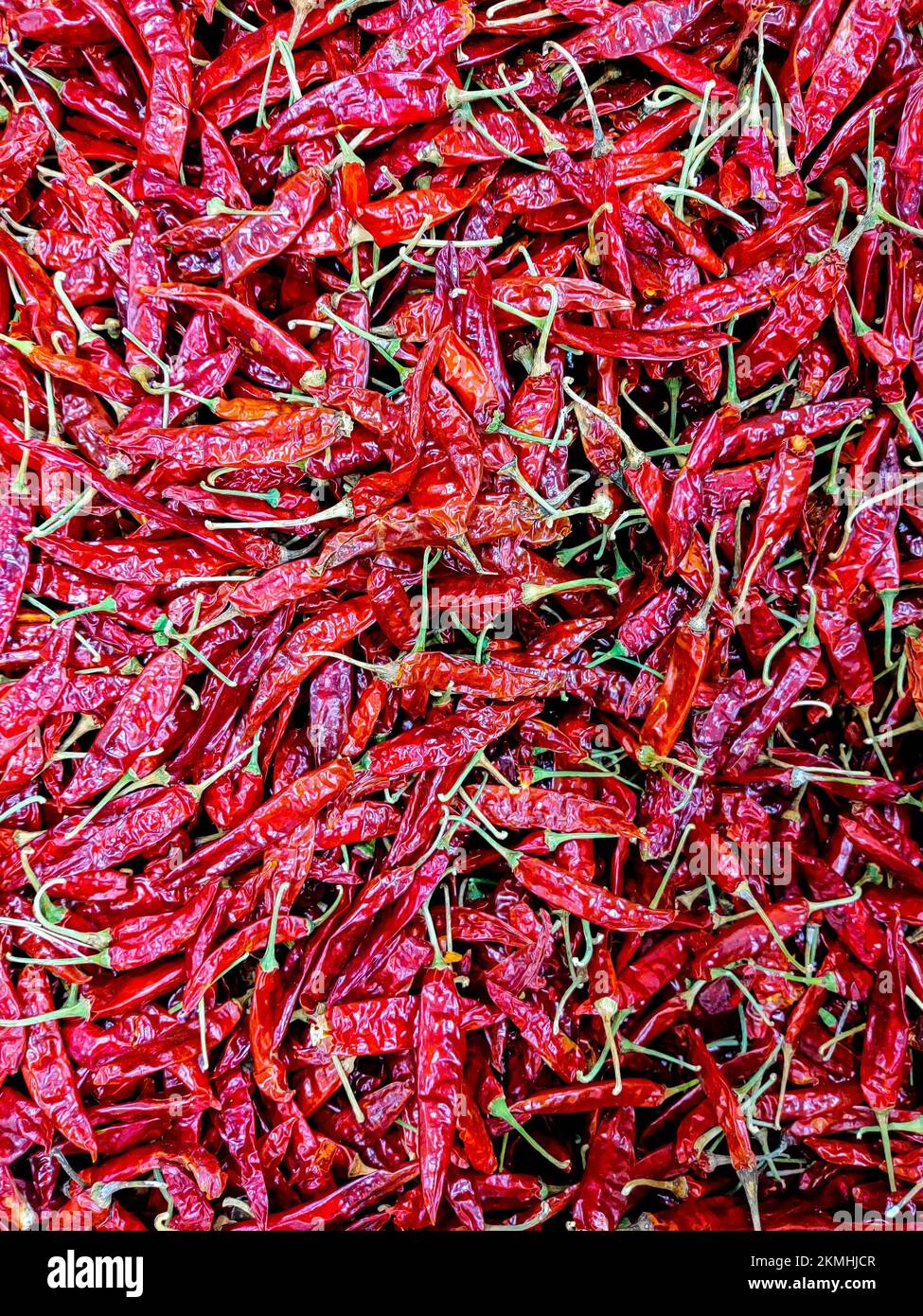 A vertical top view of chili peppers, cool for background Stock Photo ...