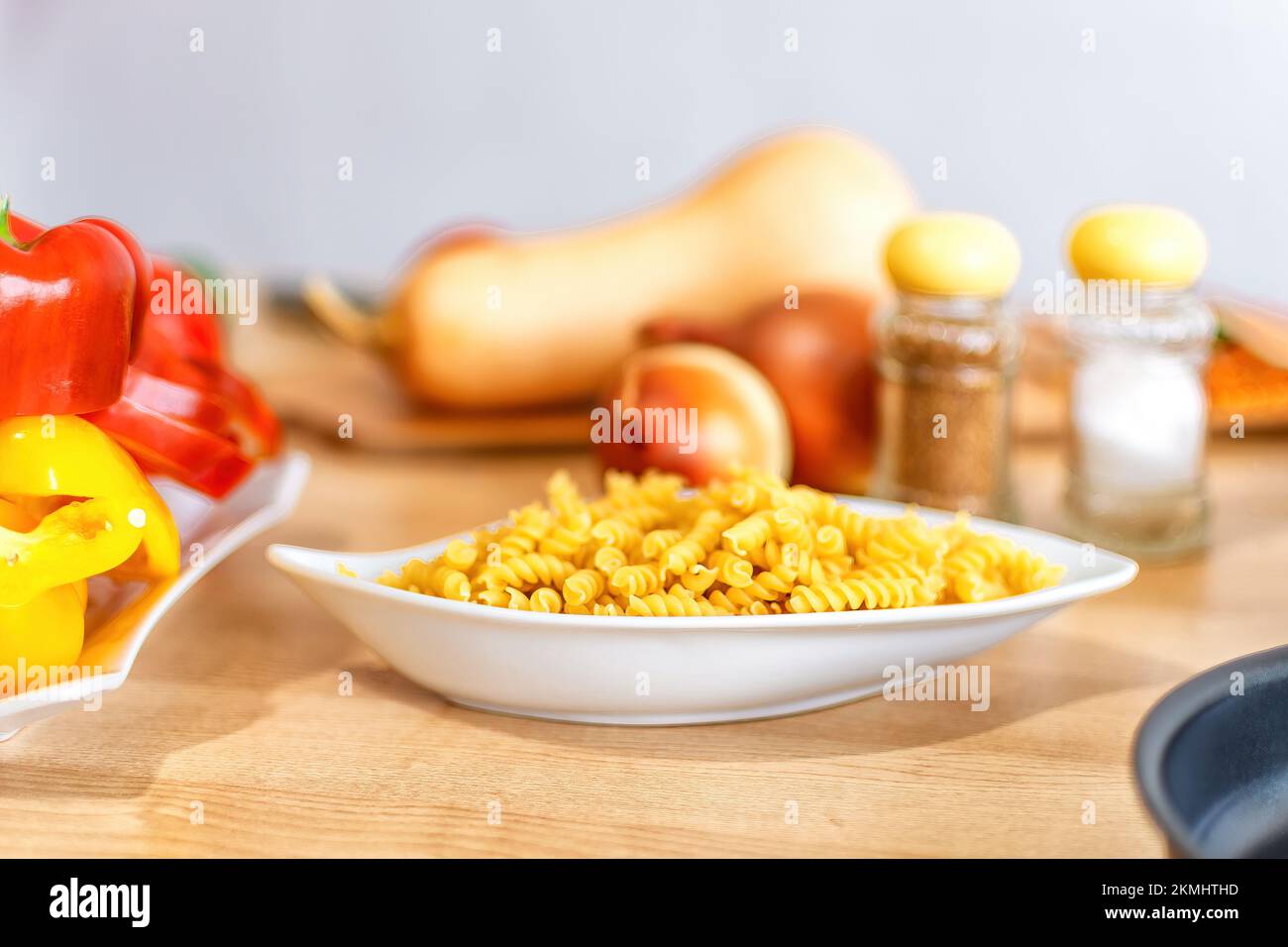 A selective focus shot of Italian Fusilli pasta in a white plate Stock ...