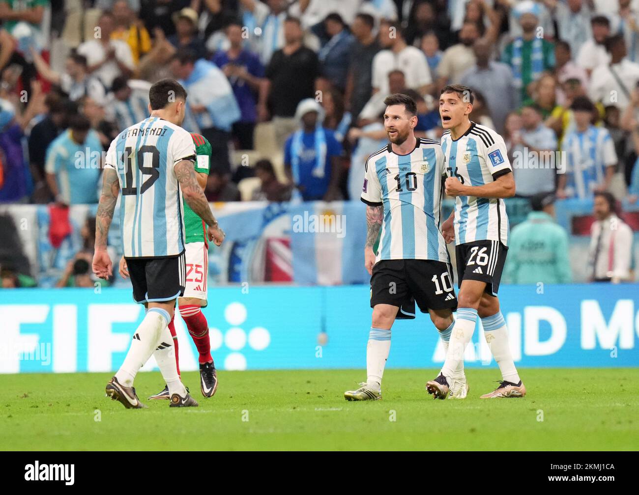 Argentina's Lionel Messi and Nahuel Molina celebrate following during ...