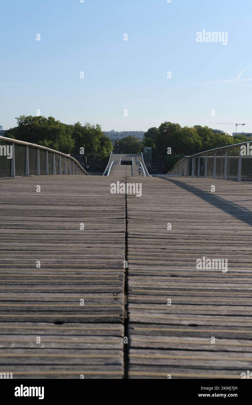 The famous Simone de Beauvoir Bridge in Paris, France under a clear sky ...