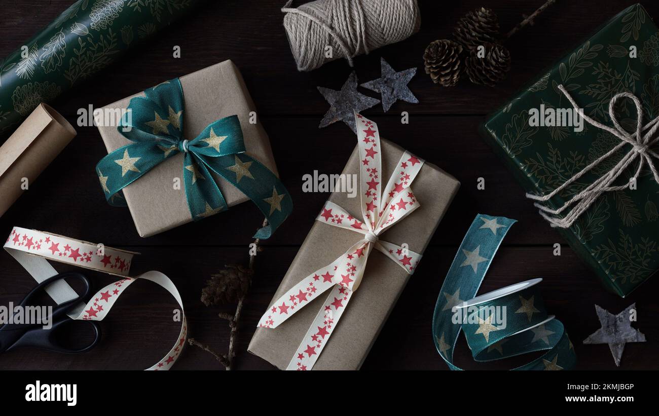 Gift boxes tied with beautiful ribbons with pattern stars with bow ...