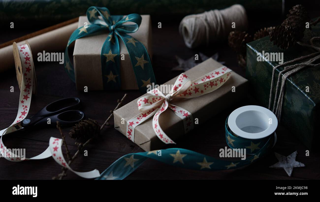 Gift boxes tied with beautiful ribbons with pattern stars with bow ...