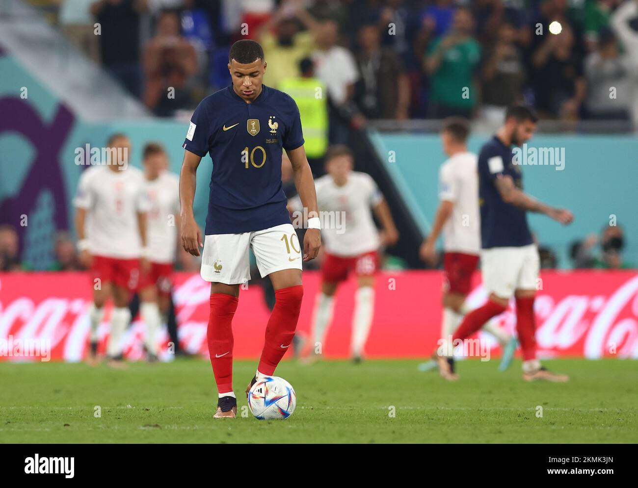 Doha, Qatar, 26th November 2022. Kylan Mbappe of France walks back to ...