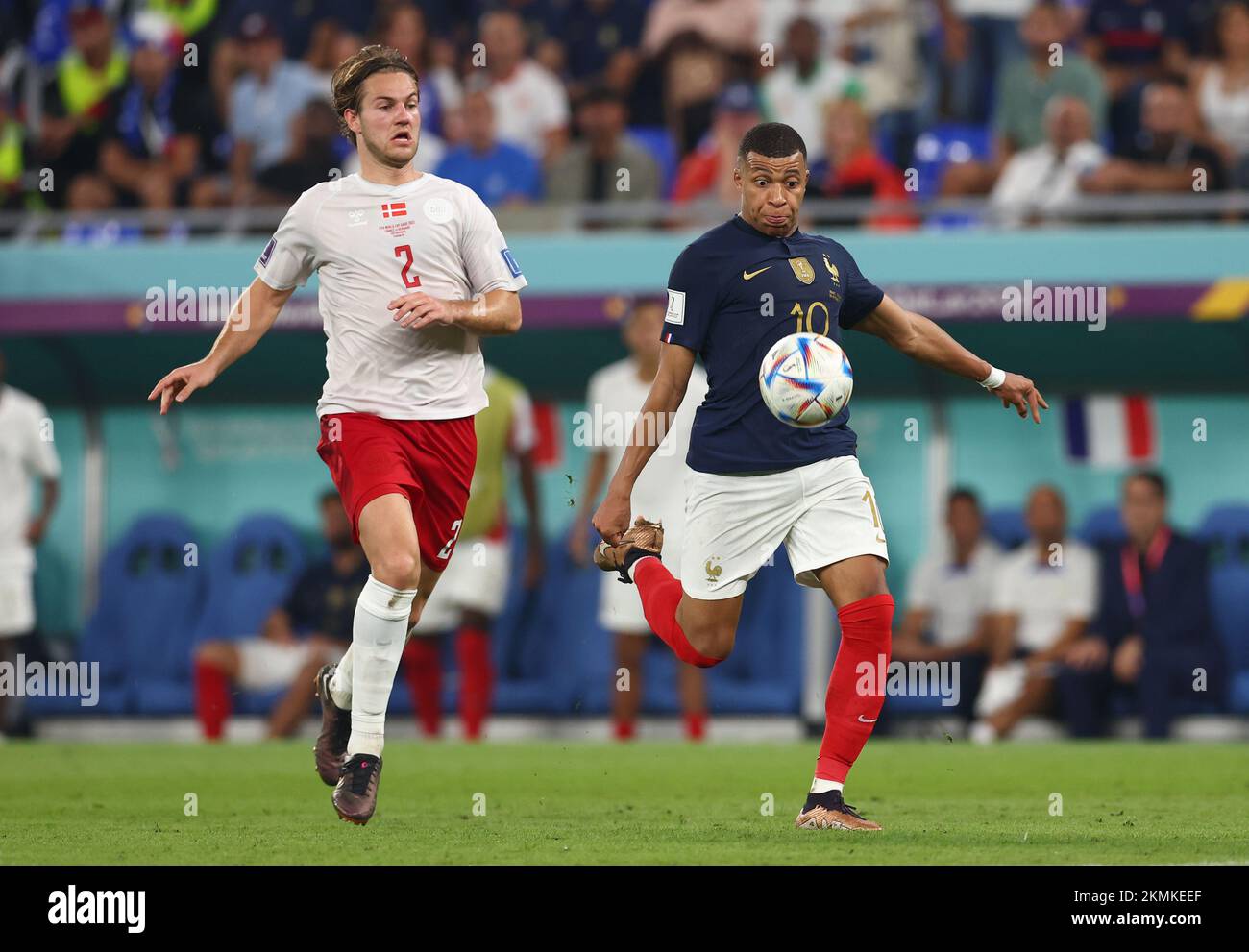 Doha, Qatar, 26th November 2022. Kylan Mbappe of France sprints clear ...