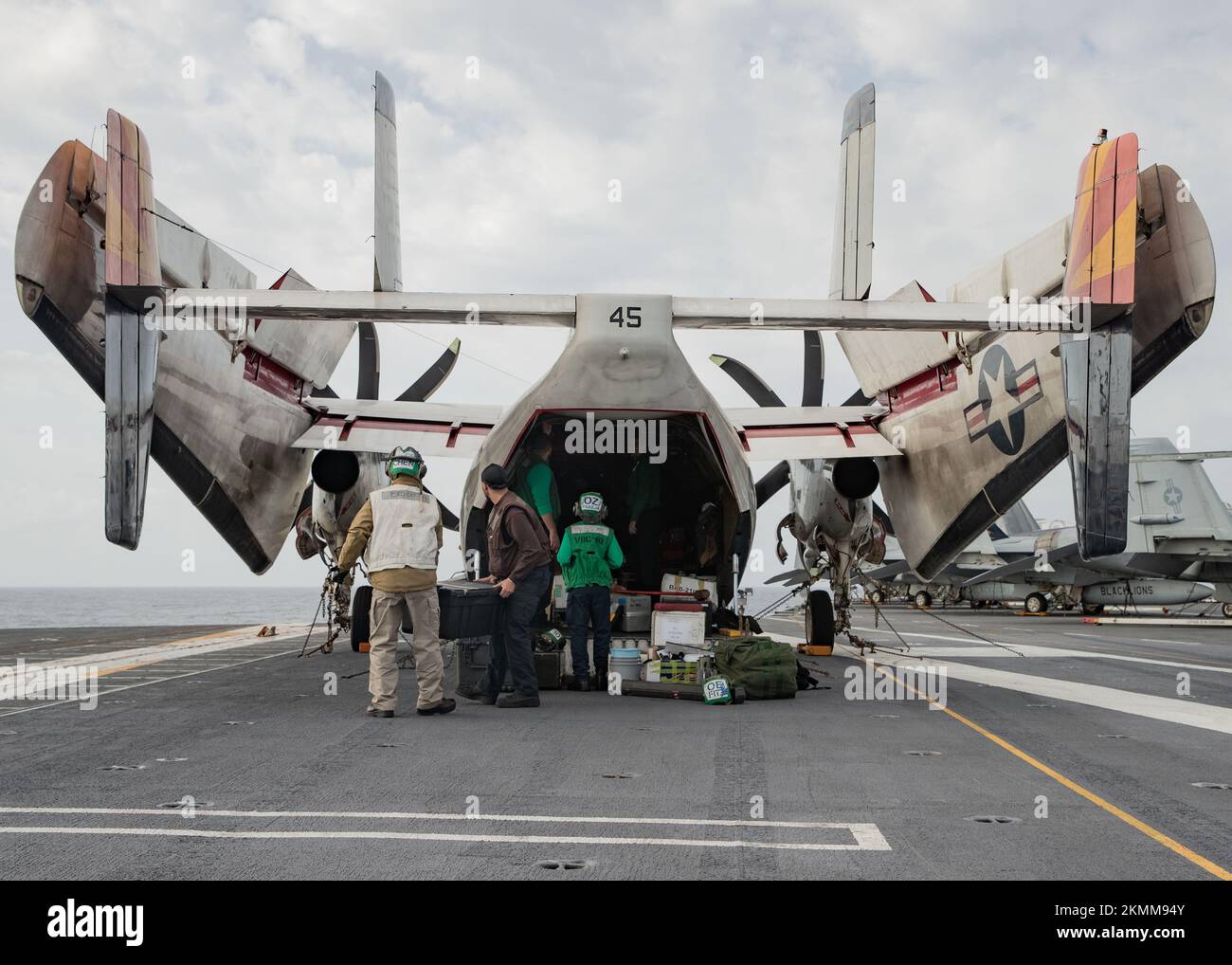 Sailors assigned to the "Rawhides" of Fleet Logistics Support Squadron ...