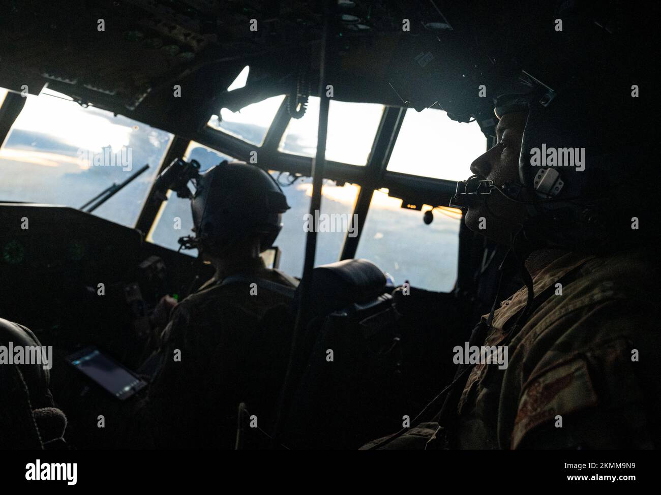 A C-130 Hercules pilot and a C-130 flight engineer assigned to the 75th ...