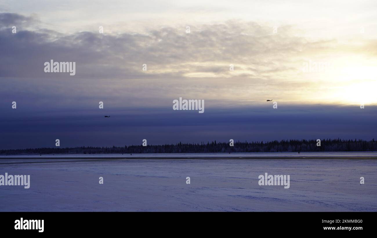An Alaska Army National Guard UH-60 and HH-60 Black Hawk helicopter ...