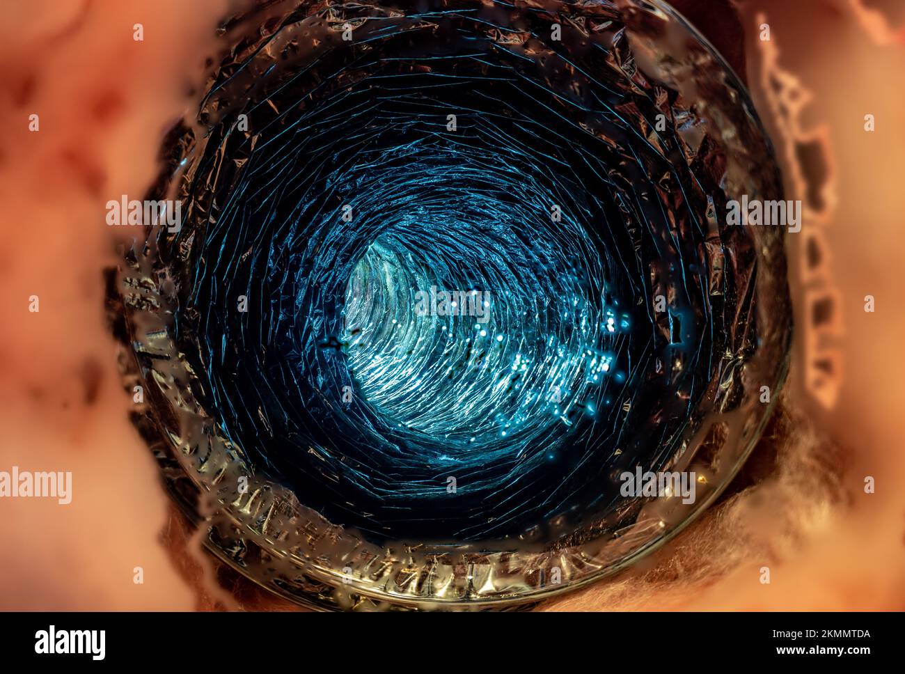 Front view looking inside a flexible pipe with thermal fiberglass ...