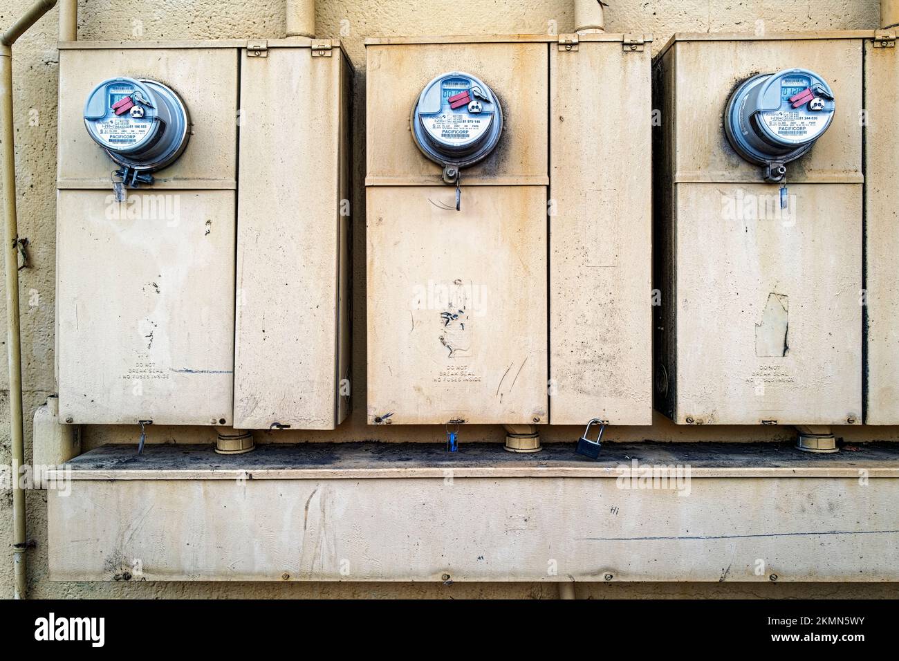 Electric meters on the exterior wall of a building in Grants Pass ...
