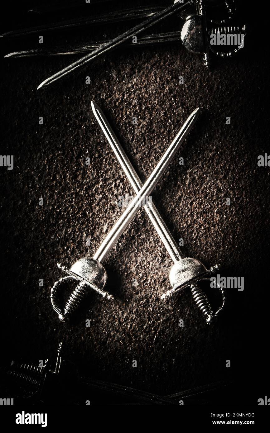 Still-life art on a battle of weapons crossed in a lock of ...