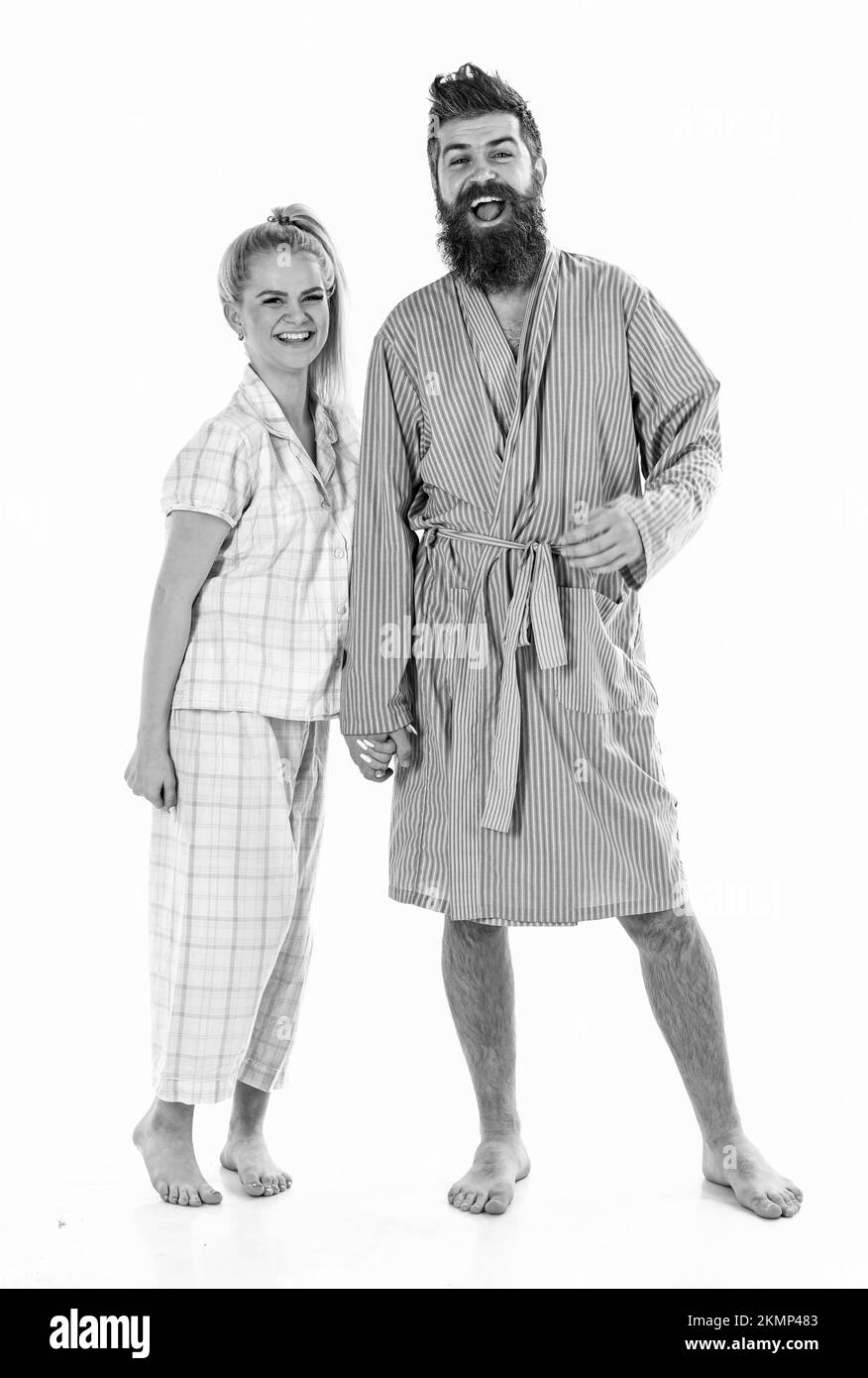Couple, family on smiling faces in clothes for sleep looks sleepy in ...
