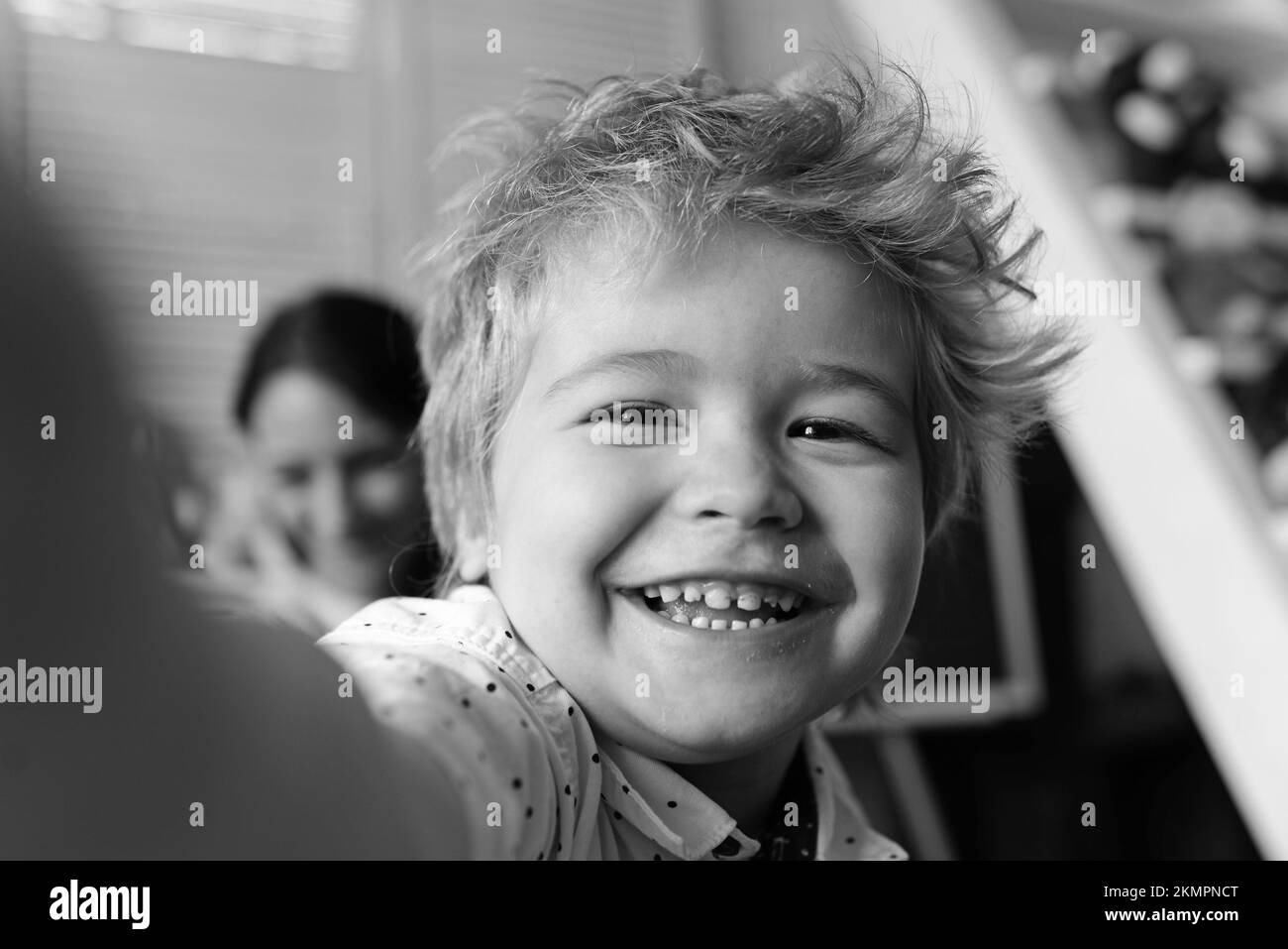 Boy spends fun time in playroom. Child with cheerful face Stock Photo ...