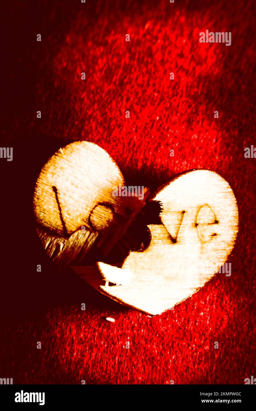 Book cover conceptual on a crushed love heart decorated, split in two ...