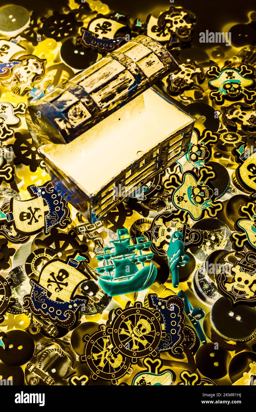 Golden composition on a treasure trove of golden chests and pirate ...