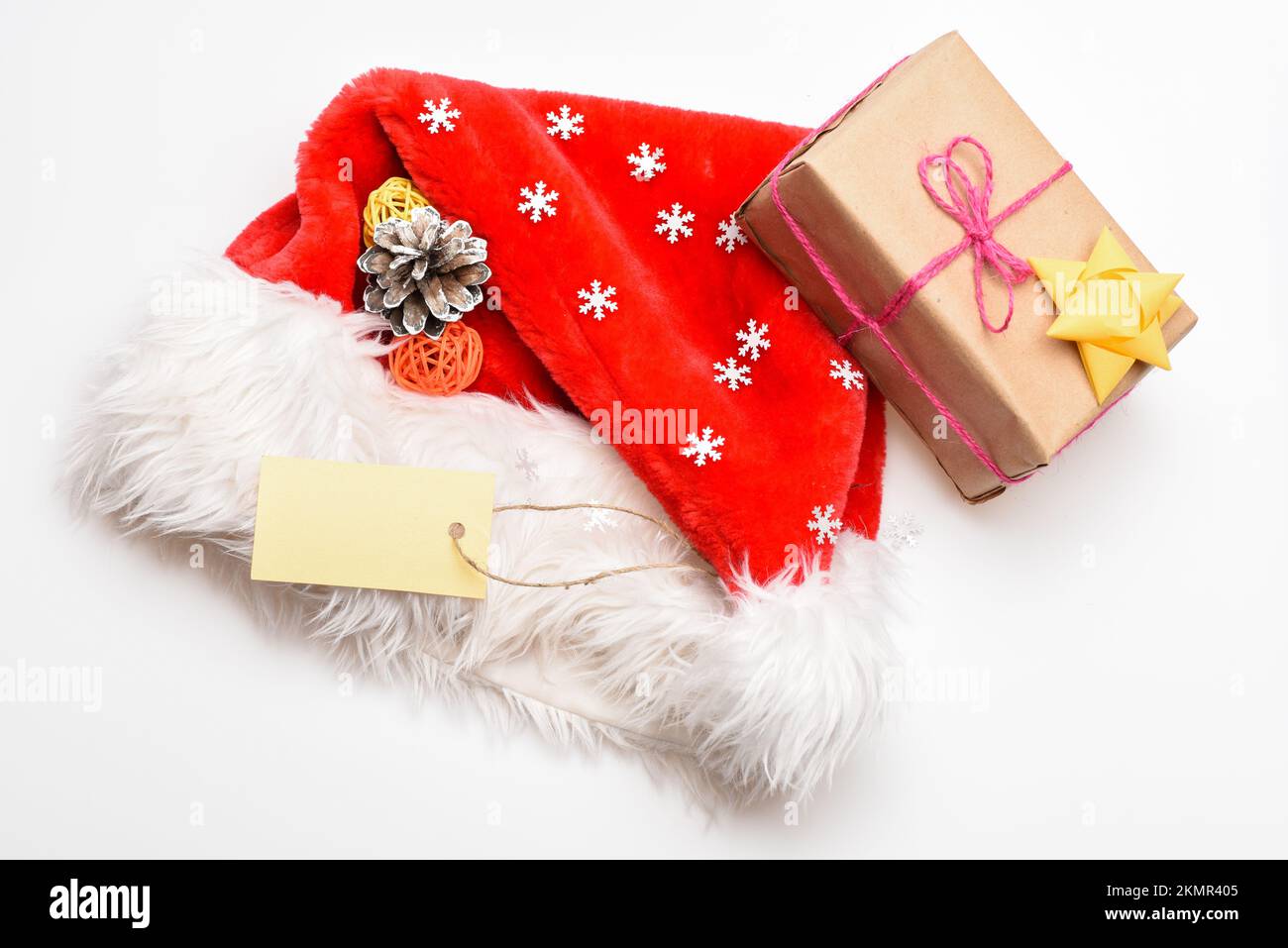 Santa hat with christmas gift box. Keep family traditions. Santa red ...
