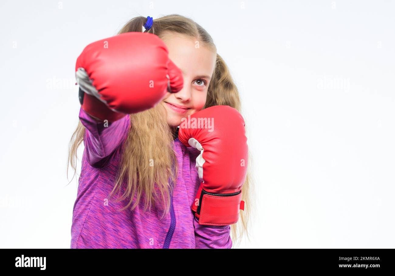 little girl in boxing gloves punching. knockout and energy. Sport ...