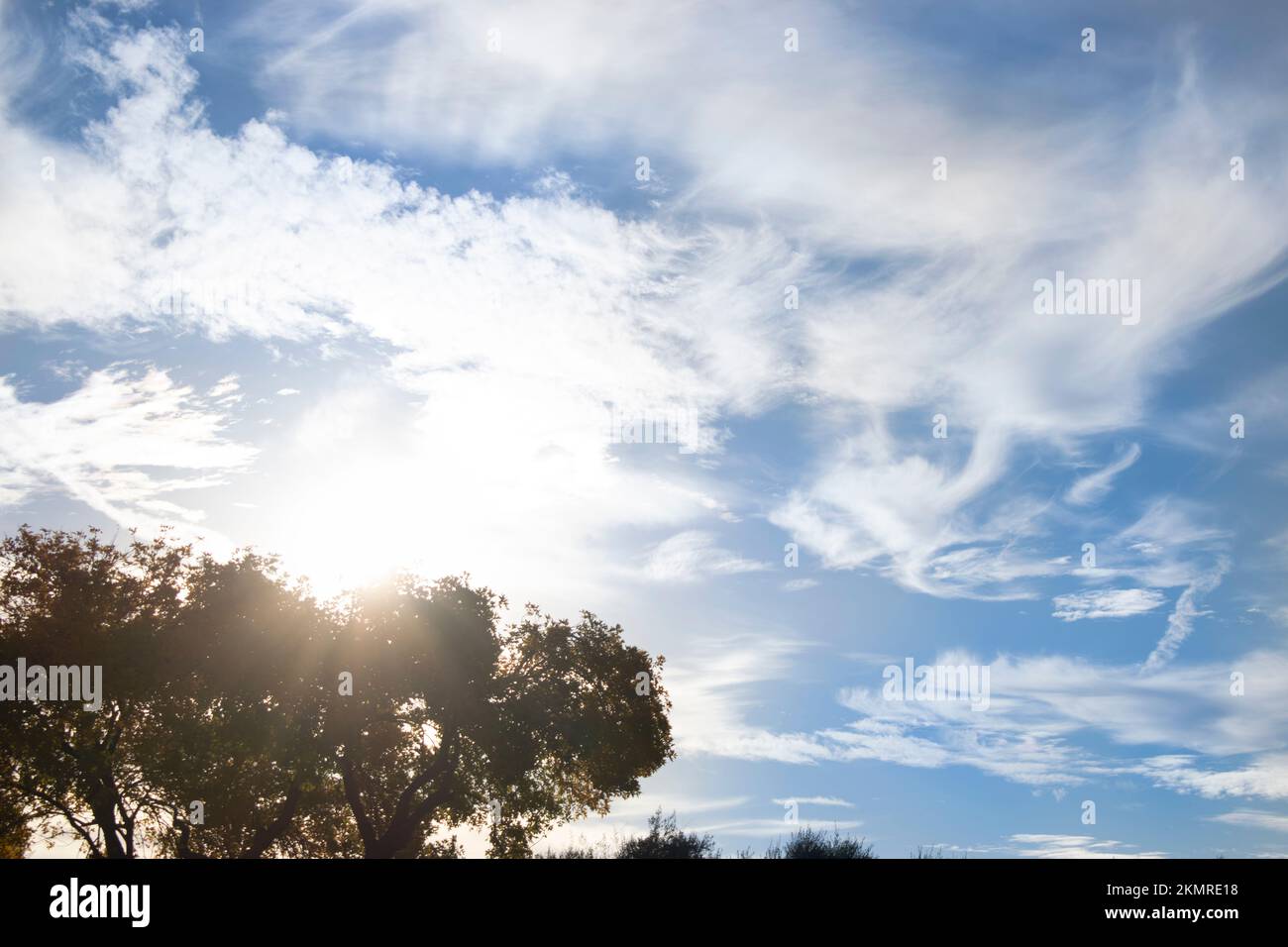 fluffy clouds in beautiful blue sky Stock Photo - Alamy