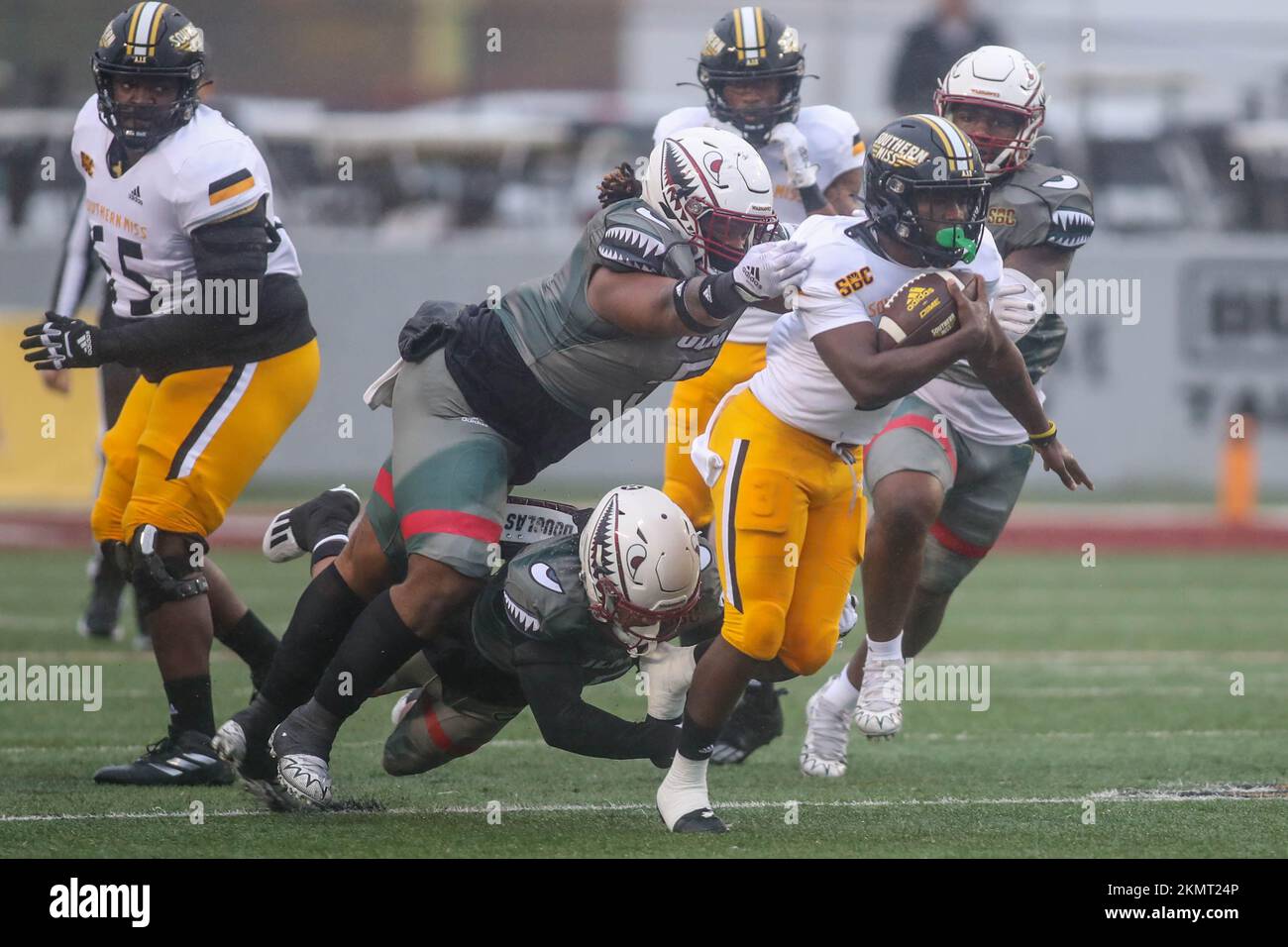 November 26, 2022: Southern Miss running back Frank Gore Jr. (3) breaks the tackle by ULM ...
