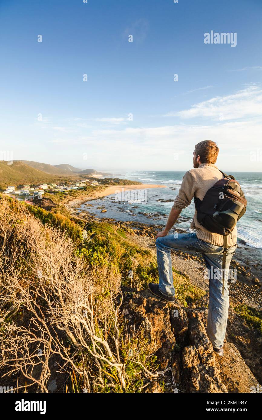 Australian travel man on a cliff at morning near the top of the ... Australian travel man on a cliff at morning near the top of the ...
