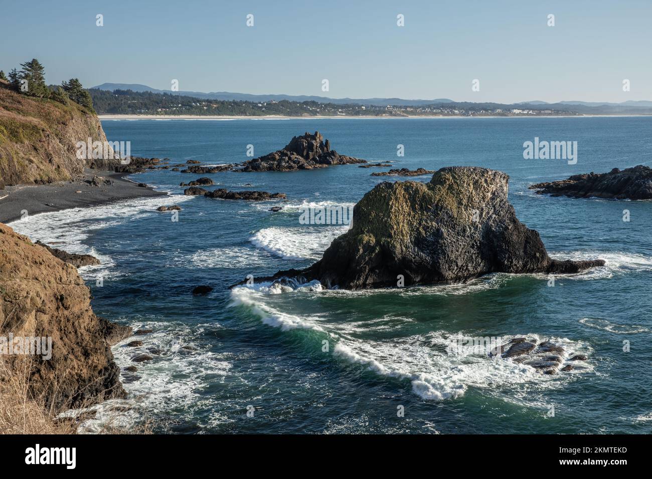 Waves and sea stacks, Yaquina Head lighthouse, Cannon Beach, Oregon ...