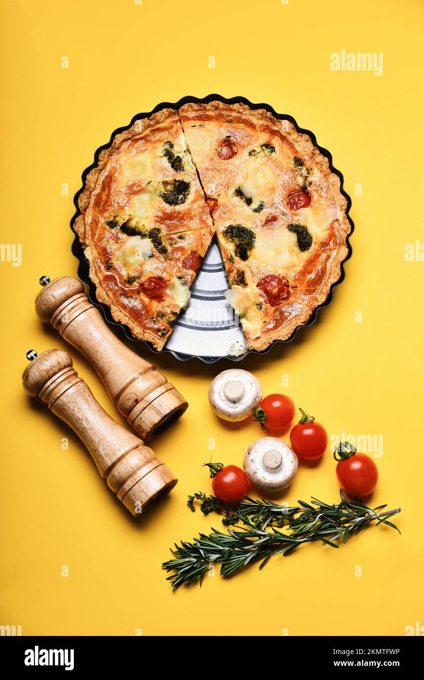 Traditional rustic cuisine concept. Pizza pie in metal baking dish ...