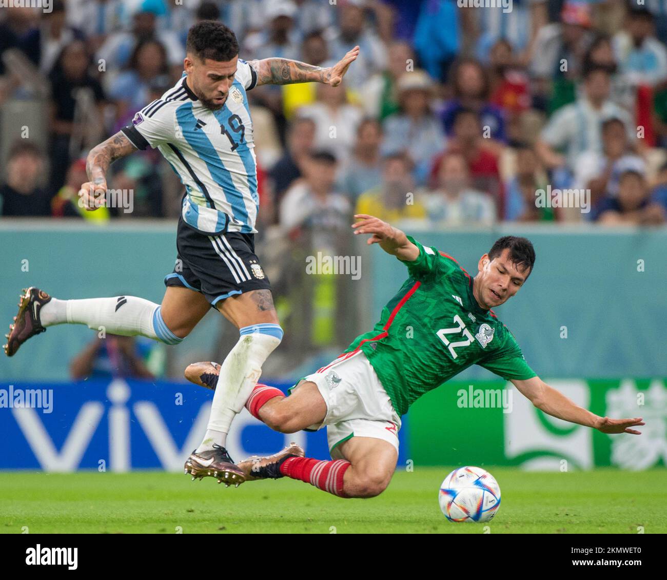 Hirving Lozano of Mexico fouled by Nicolas Otamendi of Argentina during ...