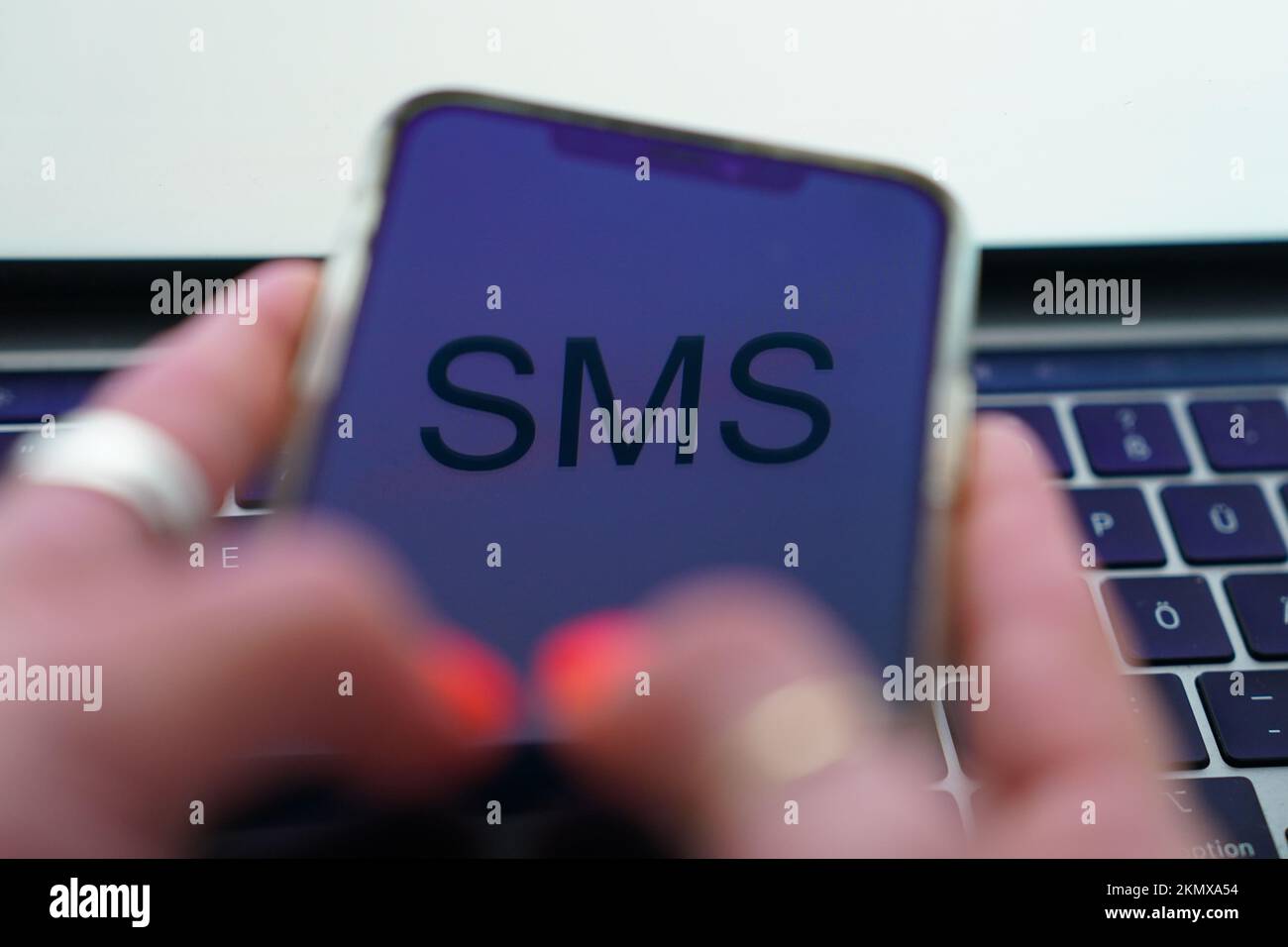 ILLUSTRATION - 25 November 2022, Hamburg: ILLUSTRATION - A woman holds ...