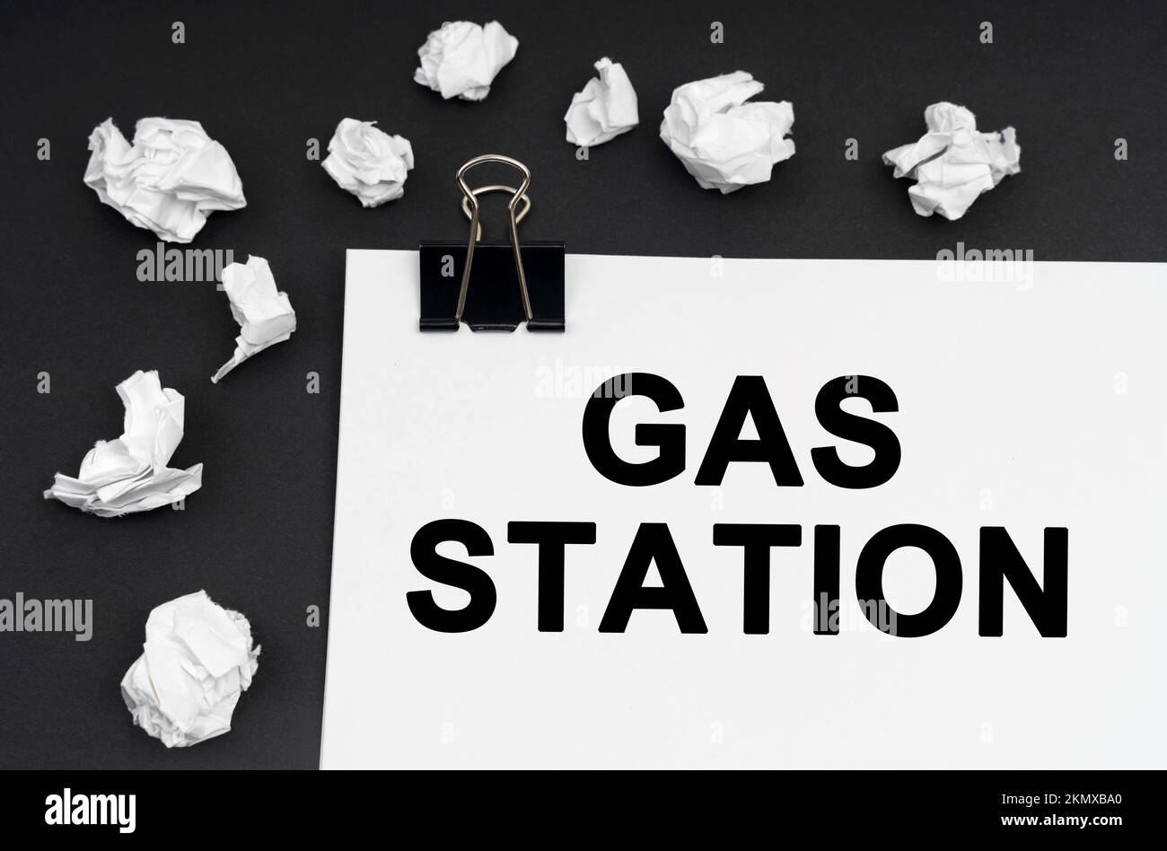 Industrial concept. On a black background, there are crumpled pieces of ...