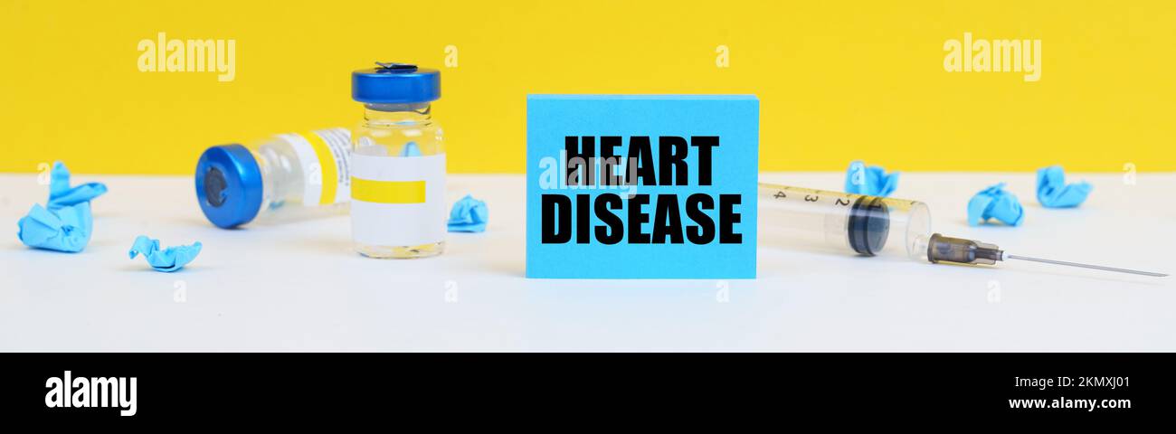 Medicine and health concept. On the table is a syringe, injections and ...