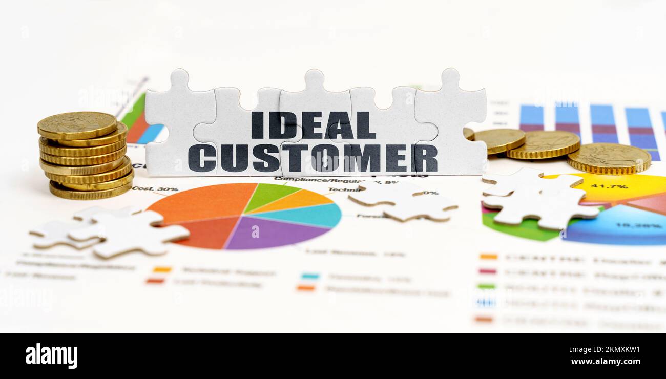 Business and Economics. There are coins and puzzles on financial charts ...