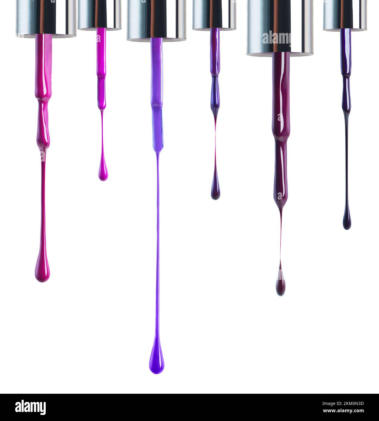Dripping droplets. Multi-coloured nailpolish dripping against white ...