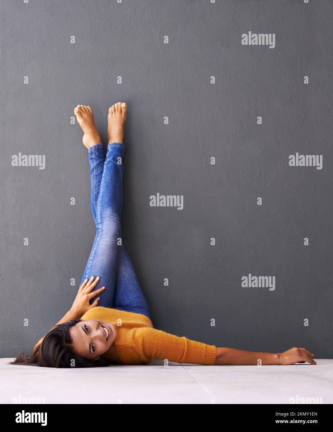 Lovely calm woman posing lying hi-res stock photography and images - Alamy