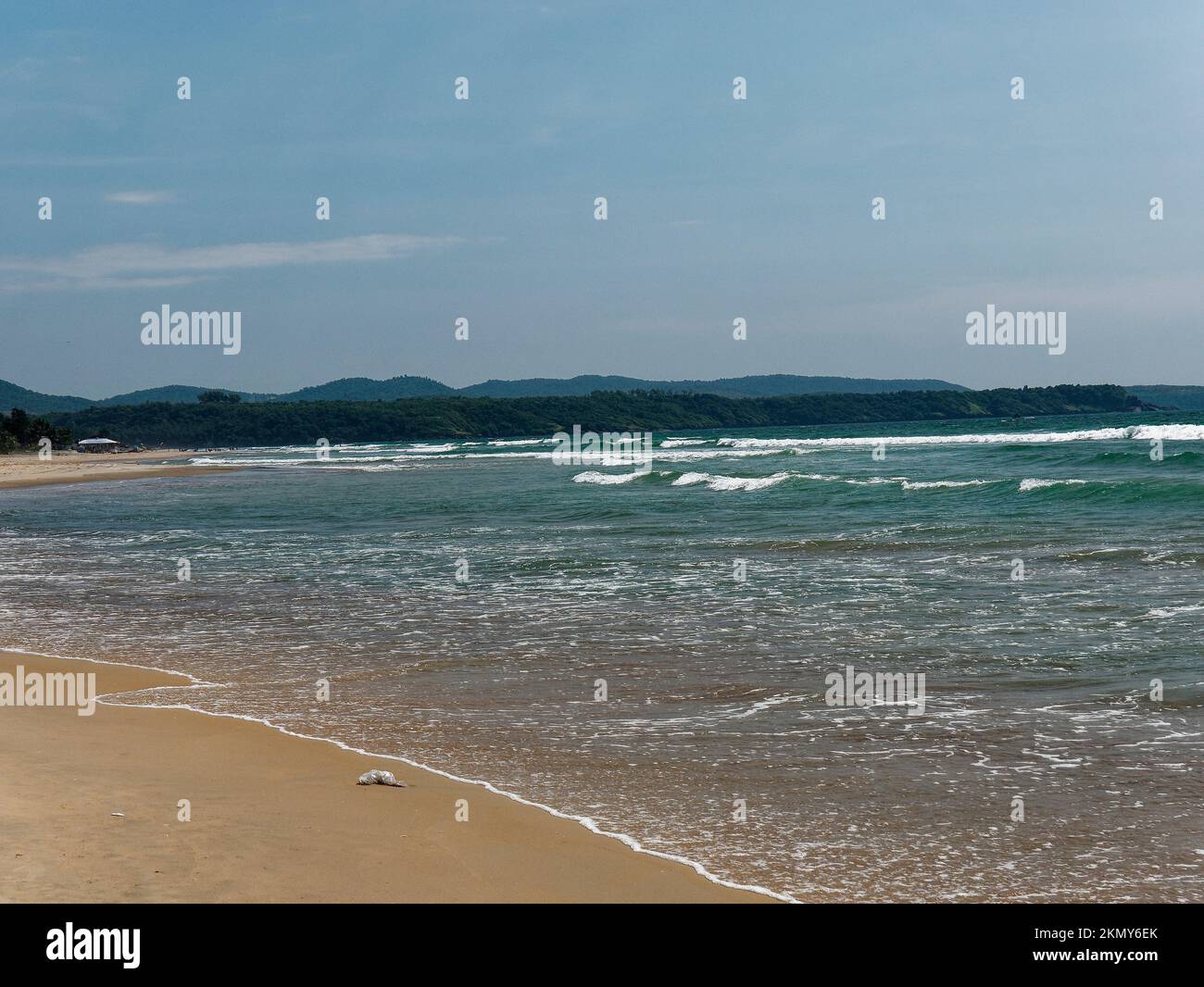 Beautiful sea waves with foam of blue and turquoise color at Colva ...