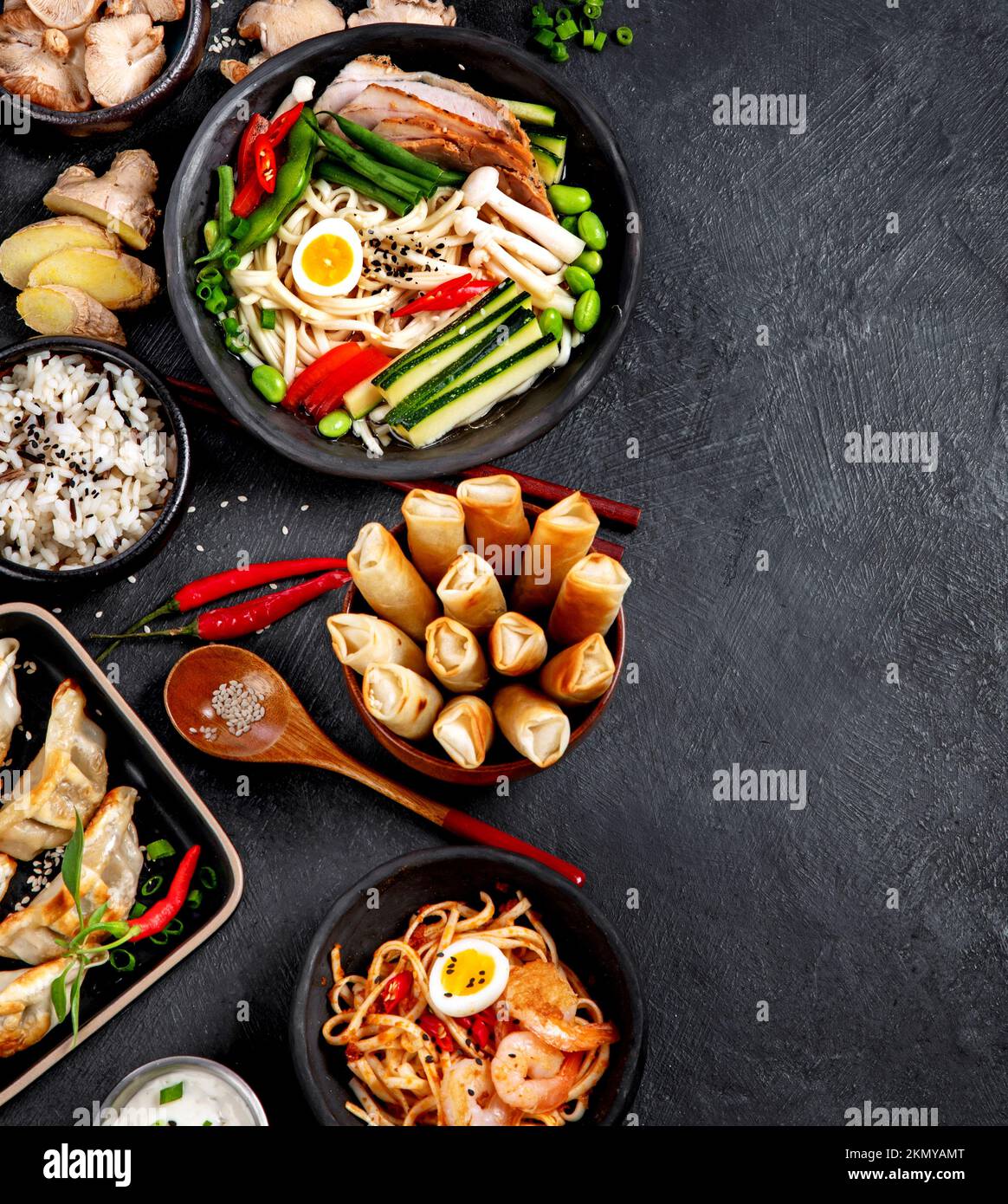 Traditional Asian food. Various of asian meals on dark background ...