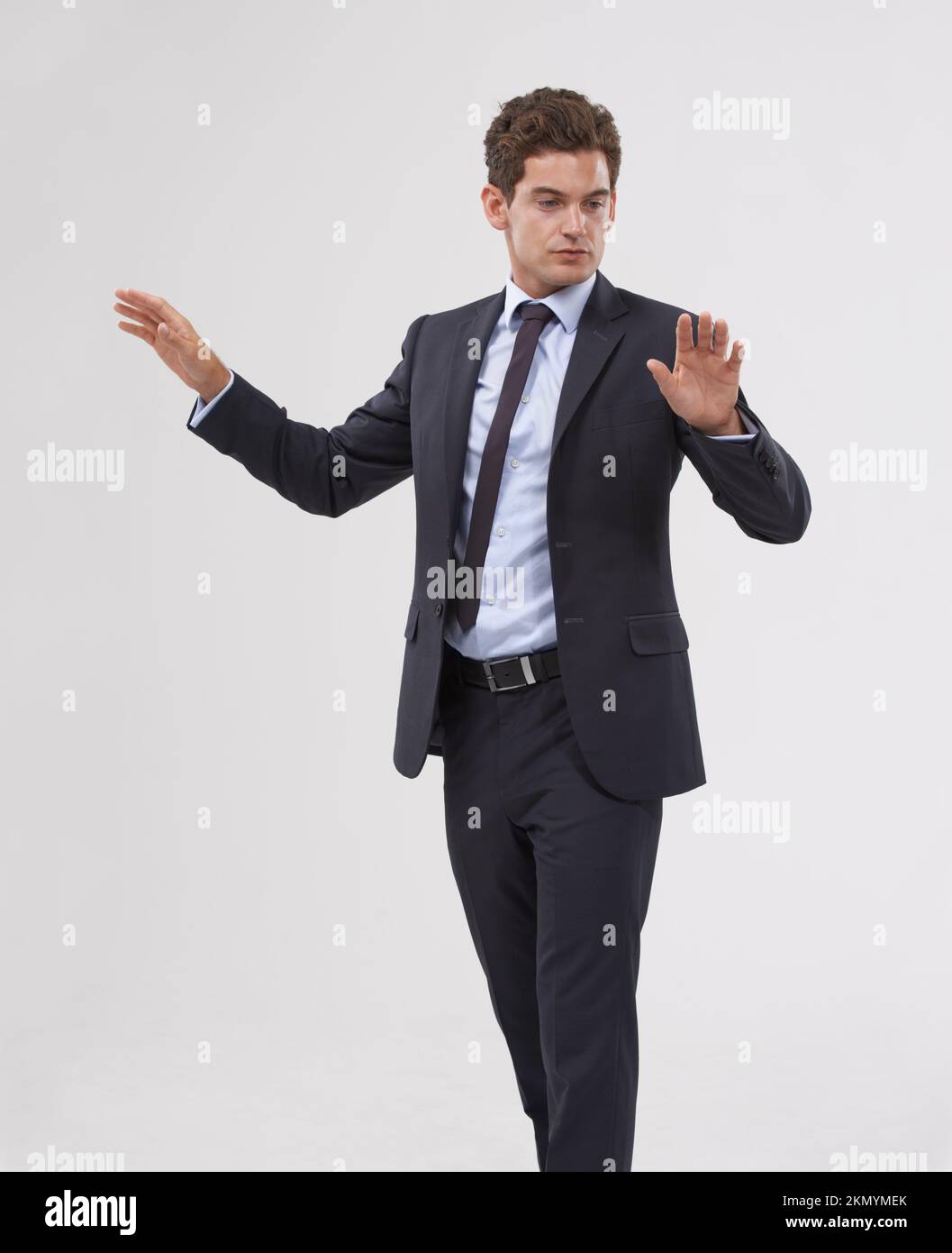 The future is now. Businessman holding up his hand in a stop sign Stock ...