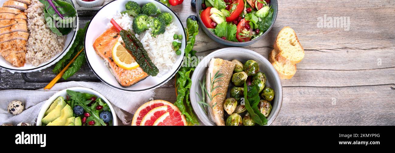 Table of various healthy food dishes. Healthy food assortment. Dieting ...