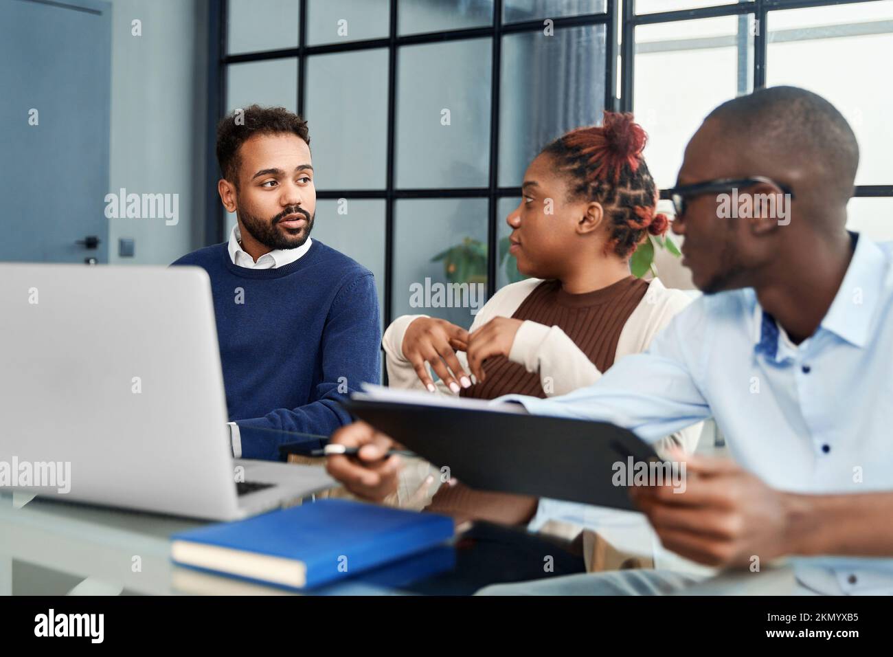 business colleagues sitting at the office desk. concept of teamwork ...