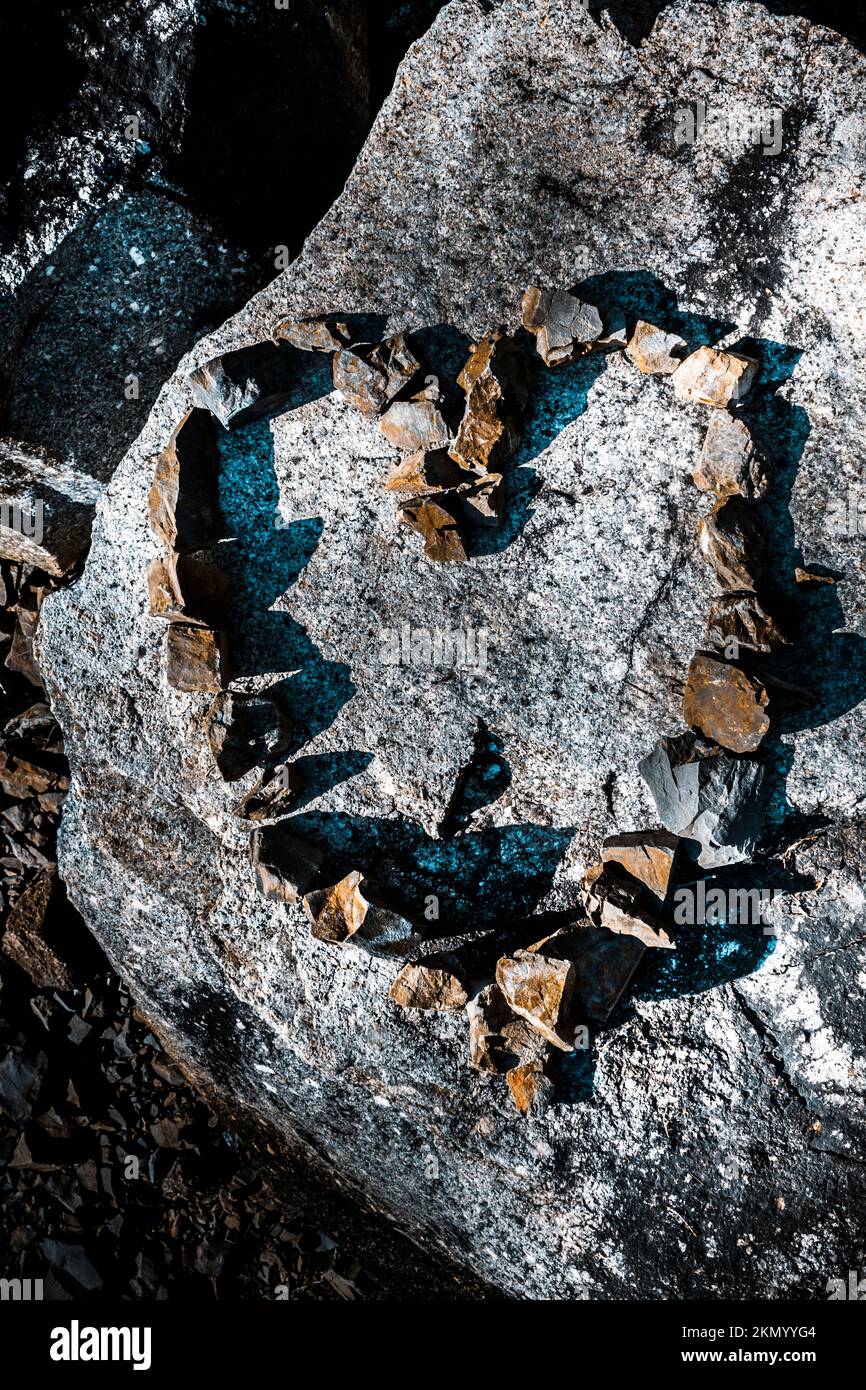 Rocks gathered together to form a whole in the symbol of unity and love ...