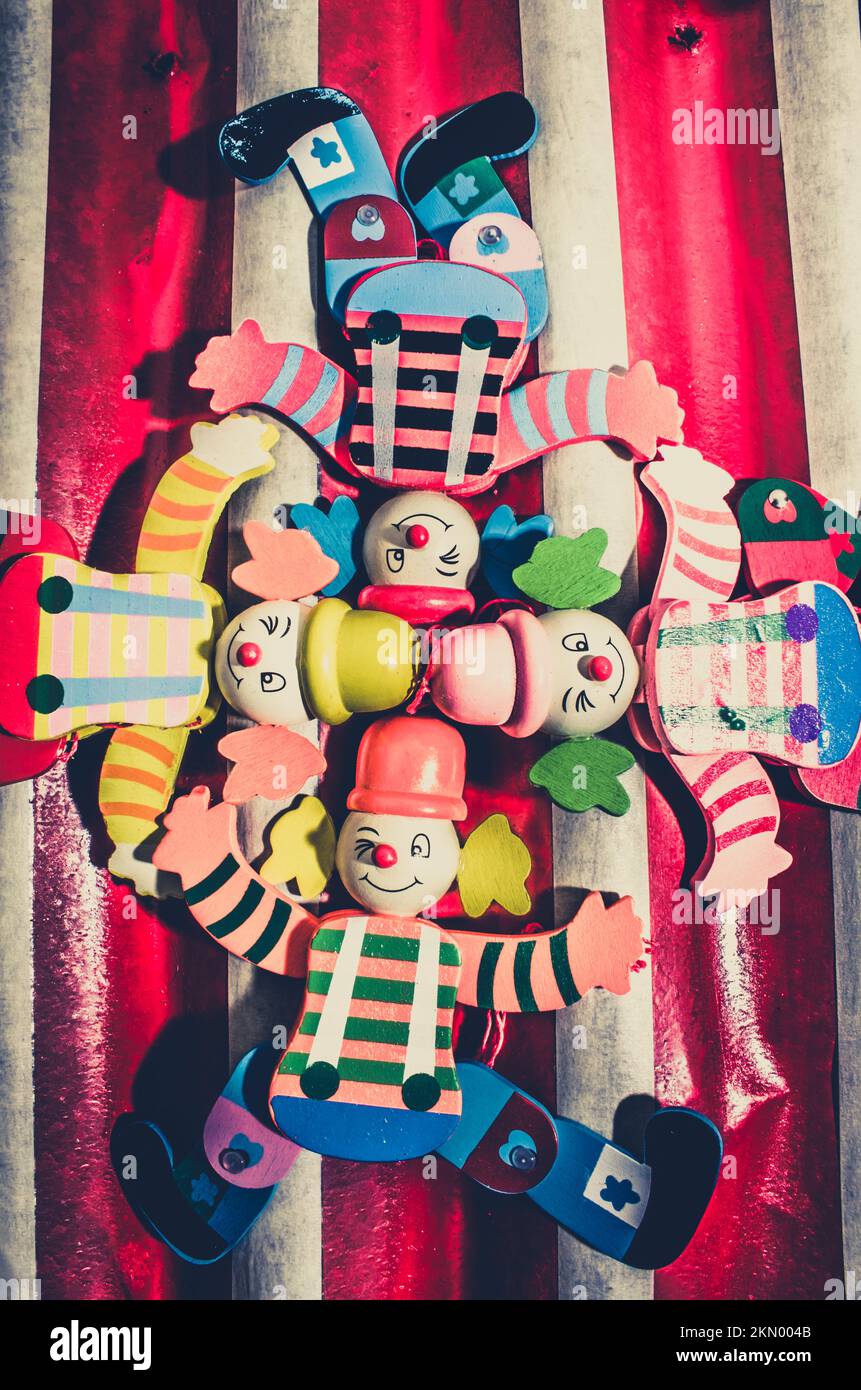 Cute and quirky toys from childhood past dancing in a wooden circus ...