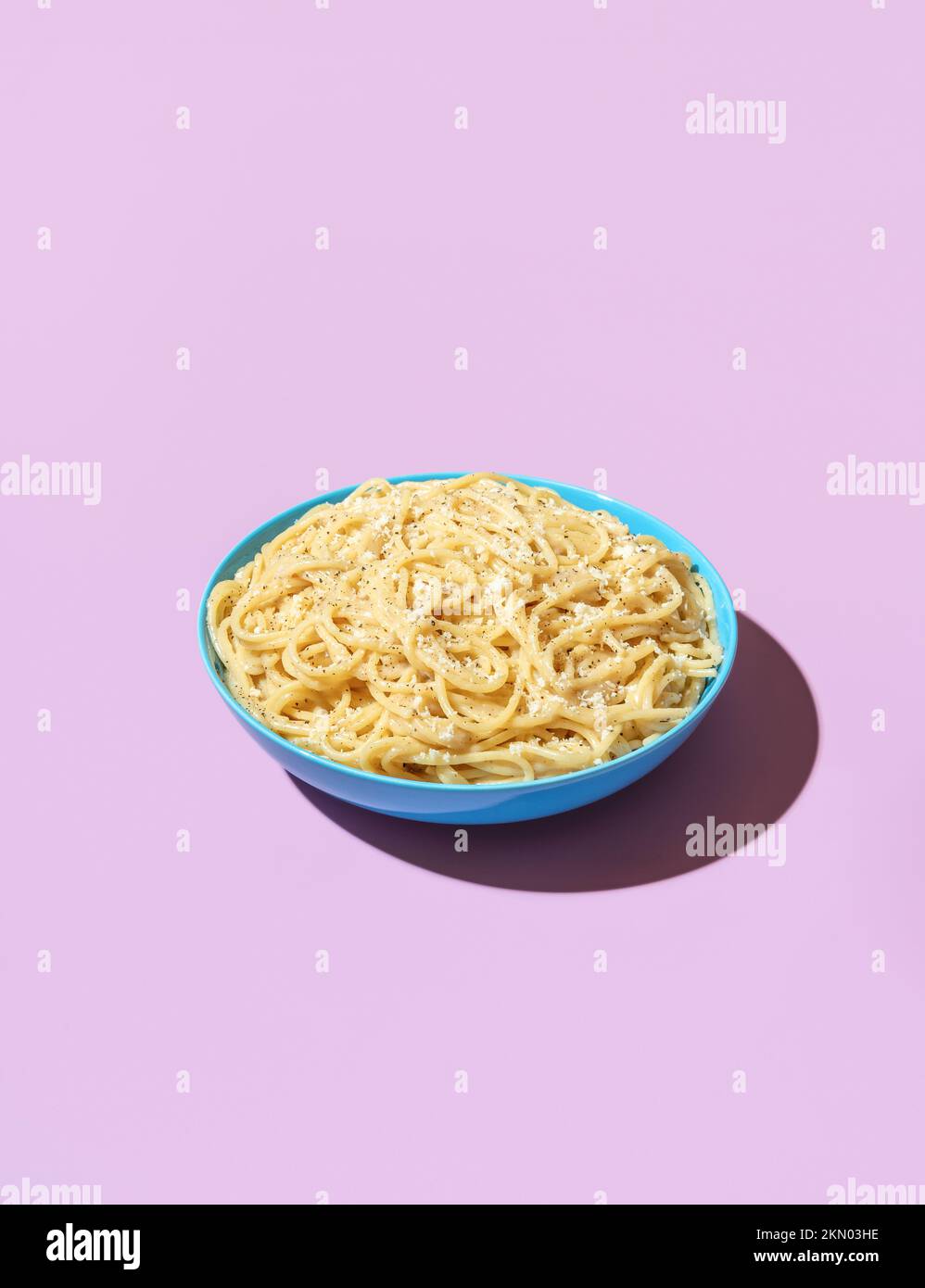 Classic italian dish, spaghetti with grated parmesan and black pepper ...