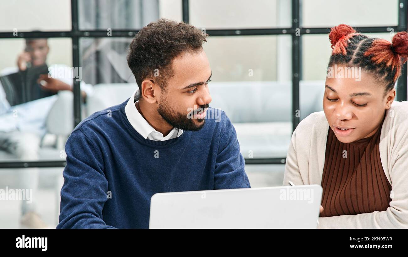 Business colleagues working at a busy open plan office Stock Photo - Alamy