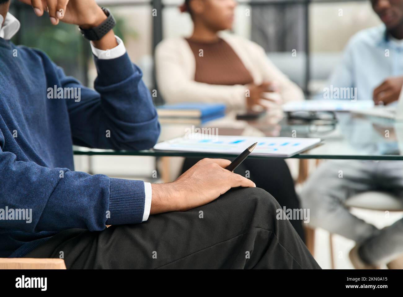 businessman sitting near the desktop with financial documents Stock ...
