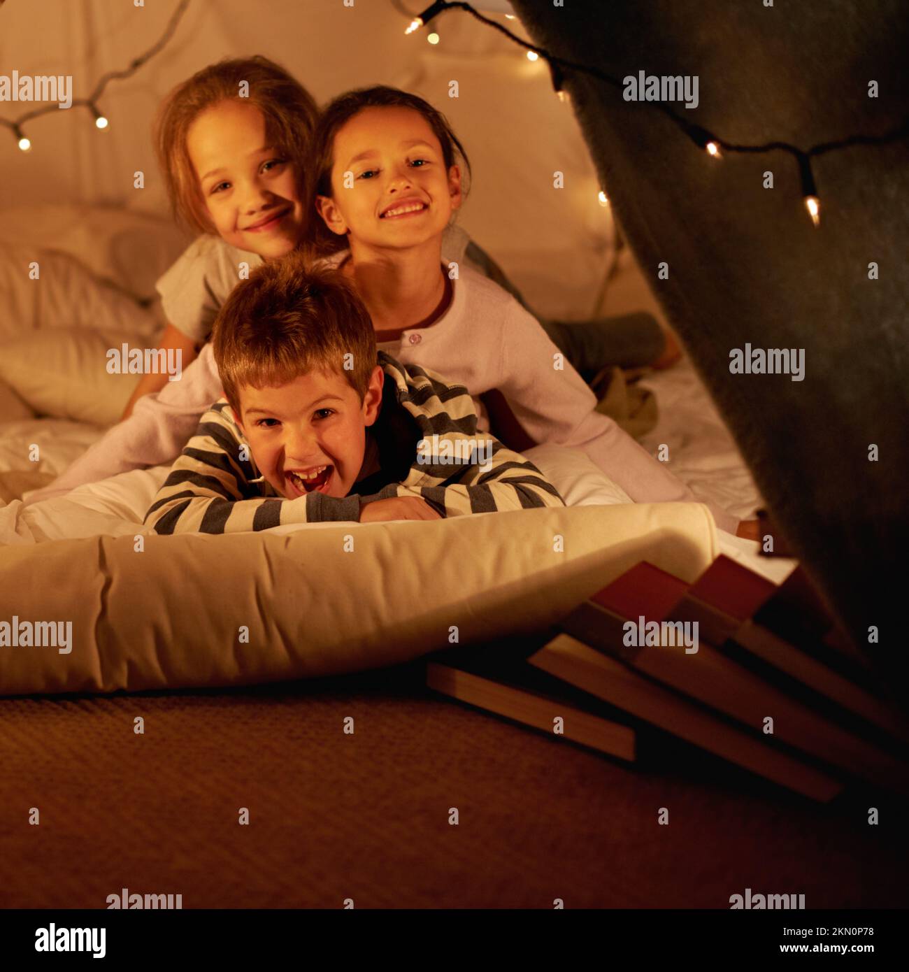 Always fun when we have a sleepover. three young children in a blanket ...