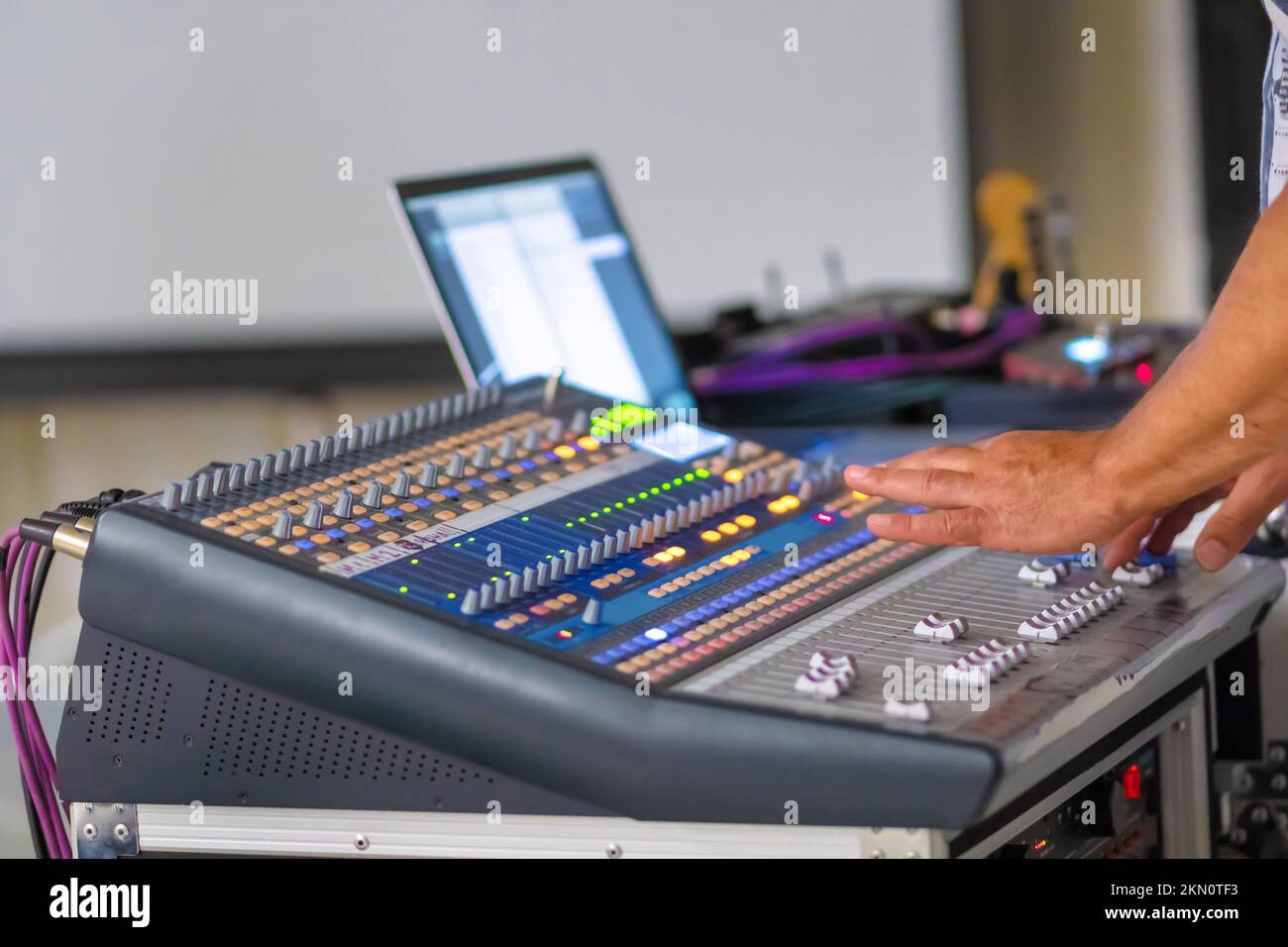 Sound engineer working at mixing panel on live. Element of design Stock ...