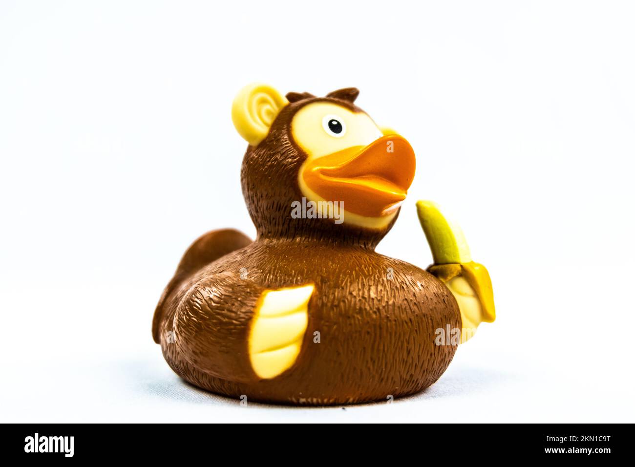 Funny monkey Duck Floating Toy with banana Stock Photo - Alamy